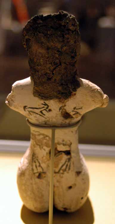 Ancient Egypt and Archaeology Web Site - d0 clay statue of woman 1